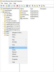 What is an Organizational Unit (OU) in Active Directory?